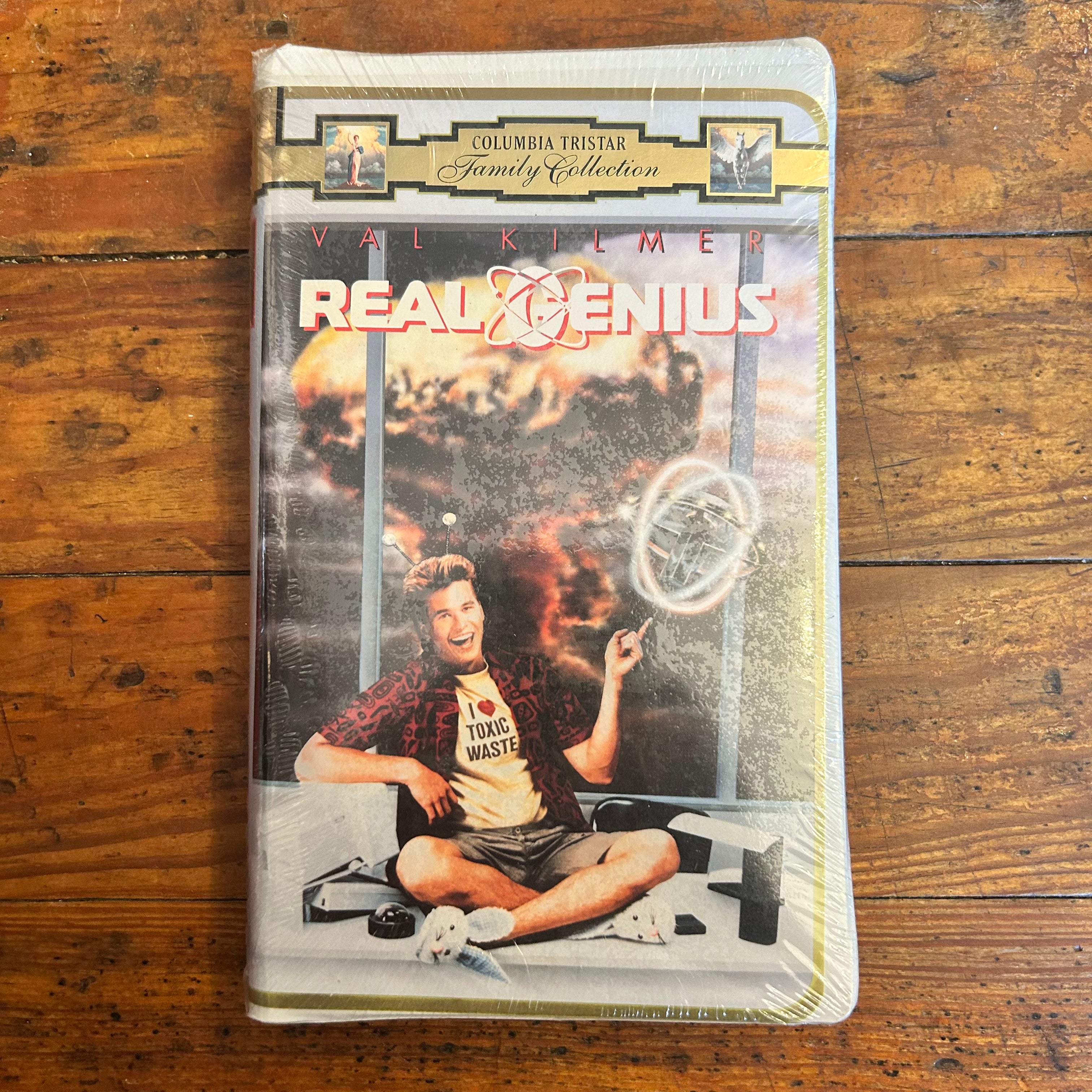 Real Genius (1985) SEALED/WATERMARK VHS – Hail - Records and Oddities